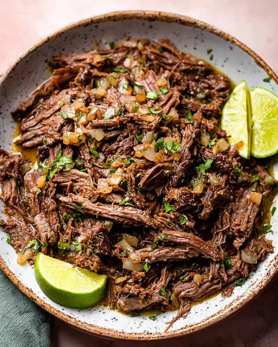 Authentic Beef Barbacoa Recipe (Slow-Cooked) - www.homemadevibes.com